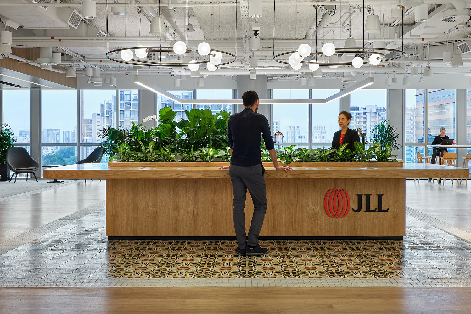 A Year Later, Fallout From JLL-HFF Merger Comes Into Focus